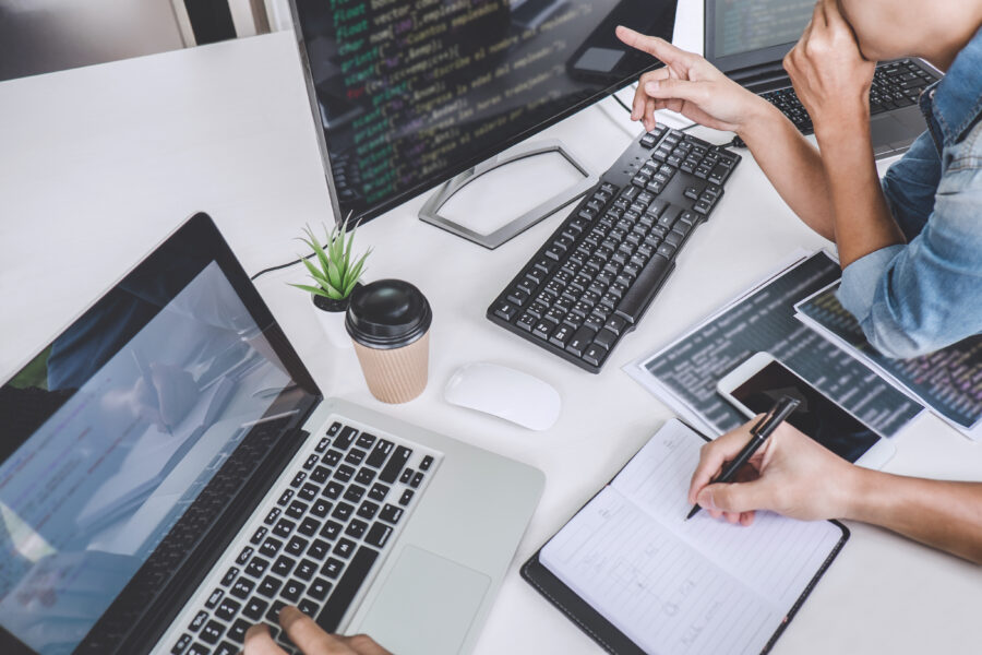Writing codes and typing data code technology, Programmer cooper - AIFS ...